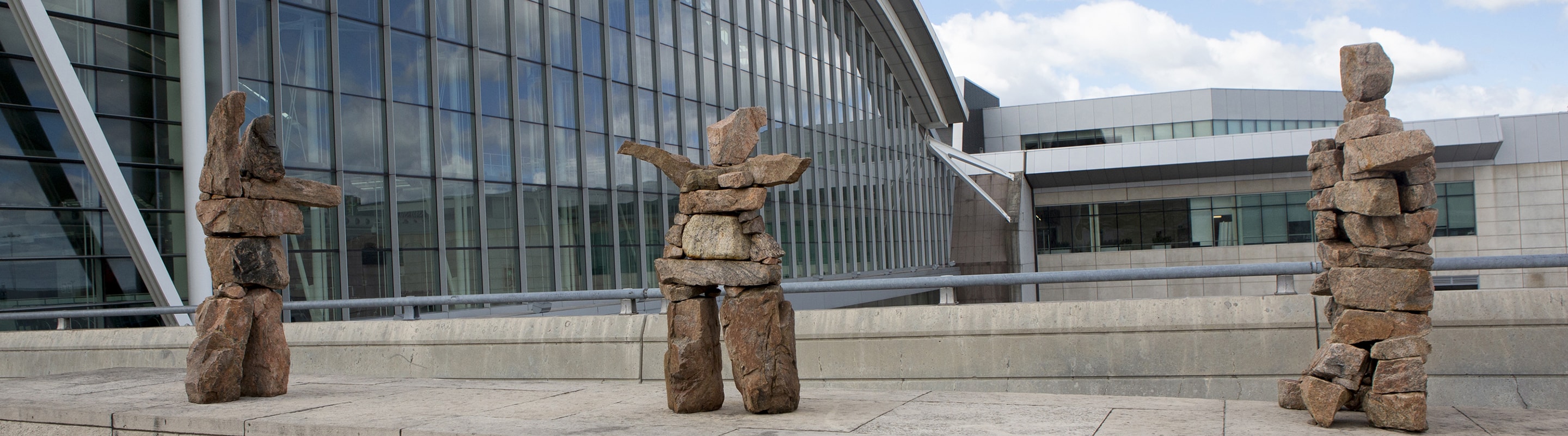 Three Inuksuit by Kiakshuk | Pearson Airport